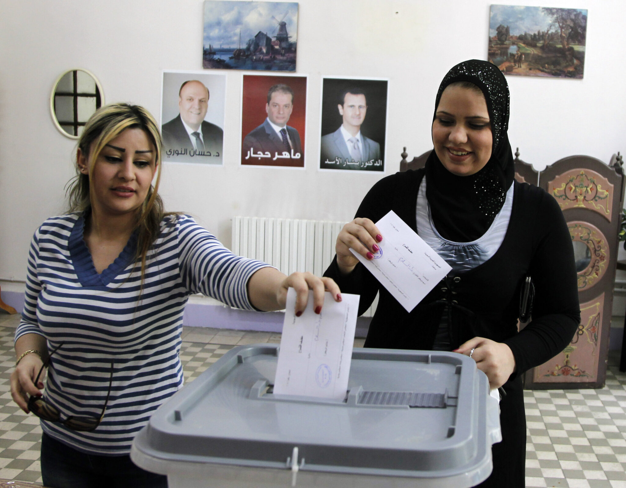In landmark Syria elections, women still face electoral hurdles ...